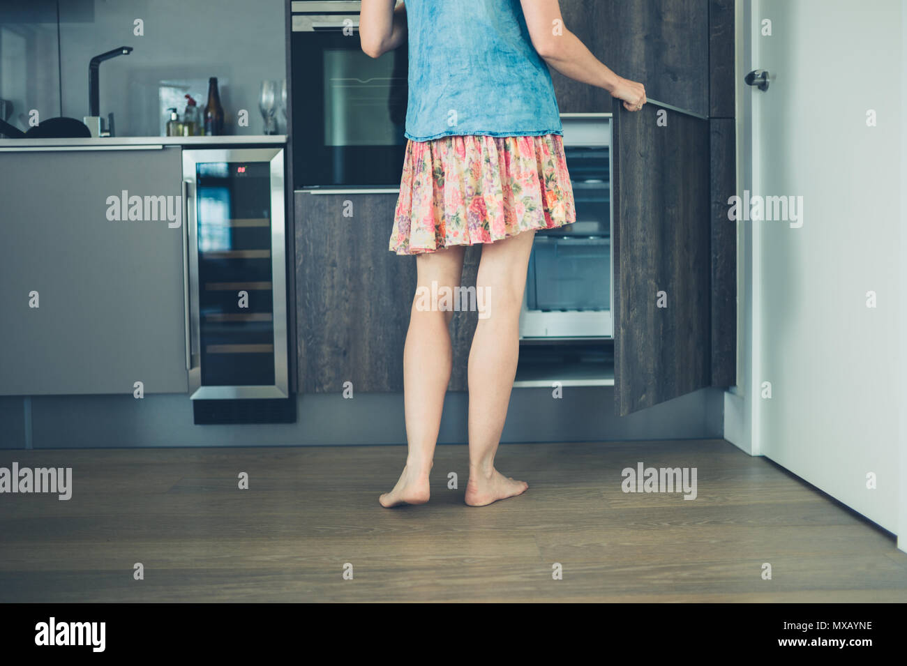 Person legs fridge freezer hi-res stock photography and images - Alamy