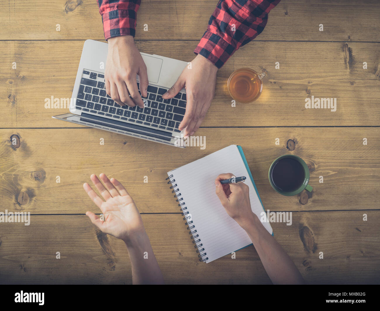 Office table notepad computer tea hi-res stock photography and images ...