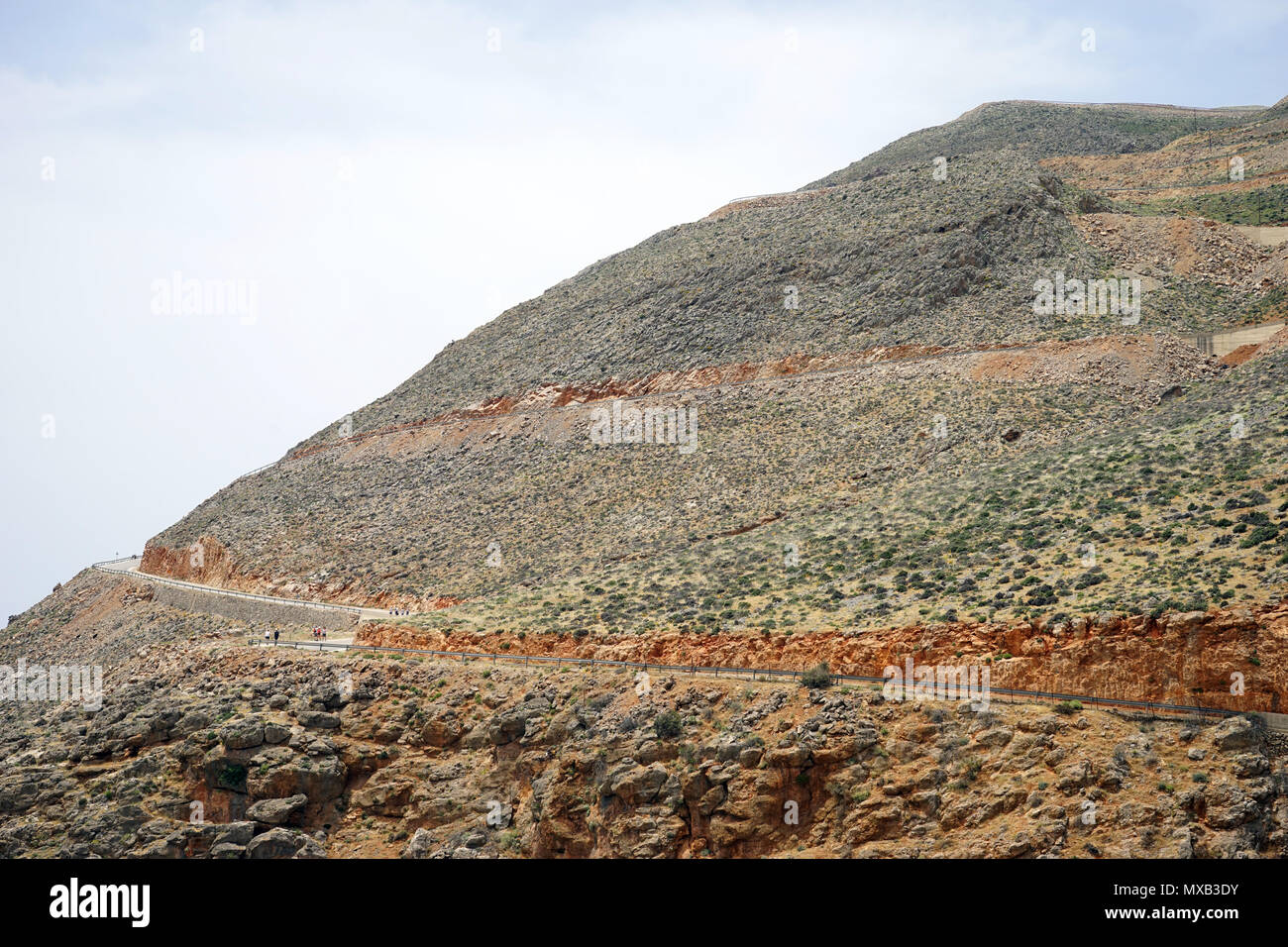 Road on the slope of south coast of Crete, Greece Stock Photo - Alamy
