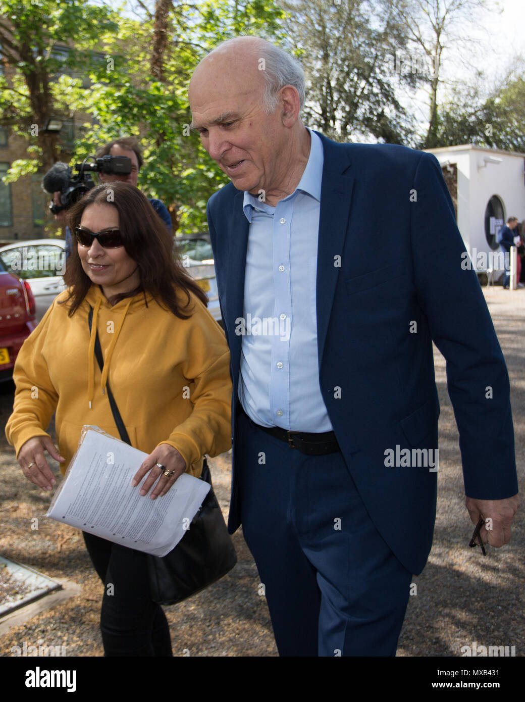 Liberal Democrat leader, Vince Cable MP, casts his vote alongside his ...