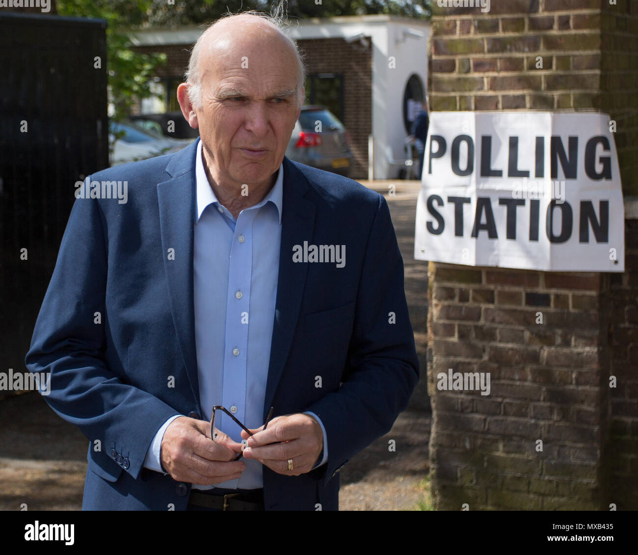 Liberal Democrat leader, Vince Cable MP, casts his vote alongside his ...
