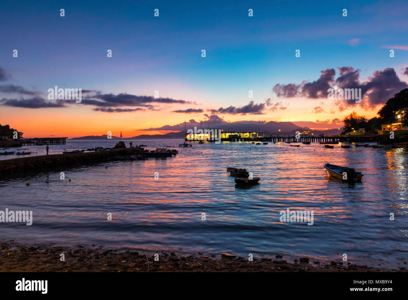 Yung Shue Wan harbour at sunset, Lamma Island, Hong Kong, SAR, China ...