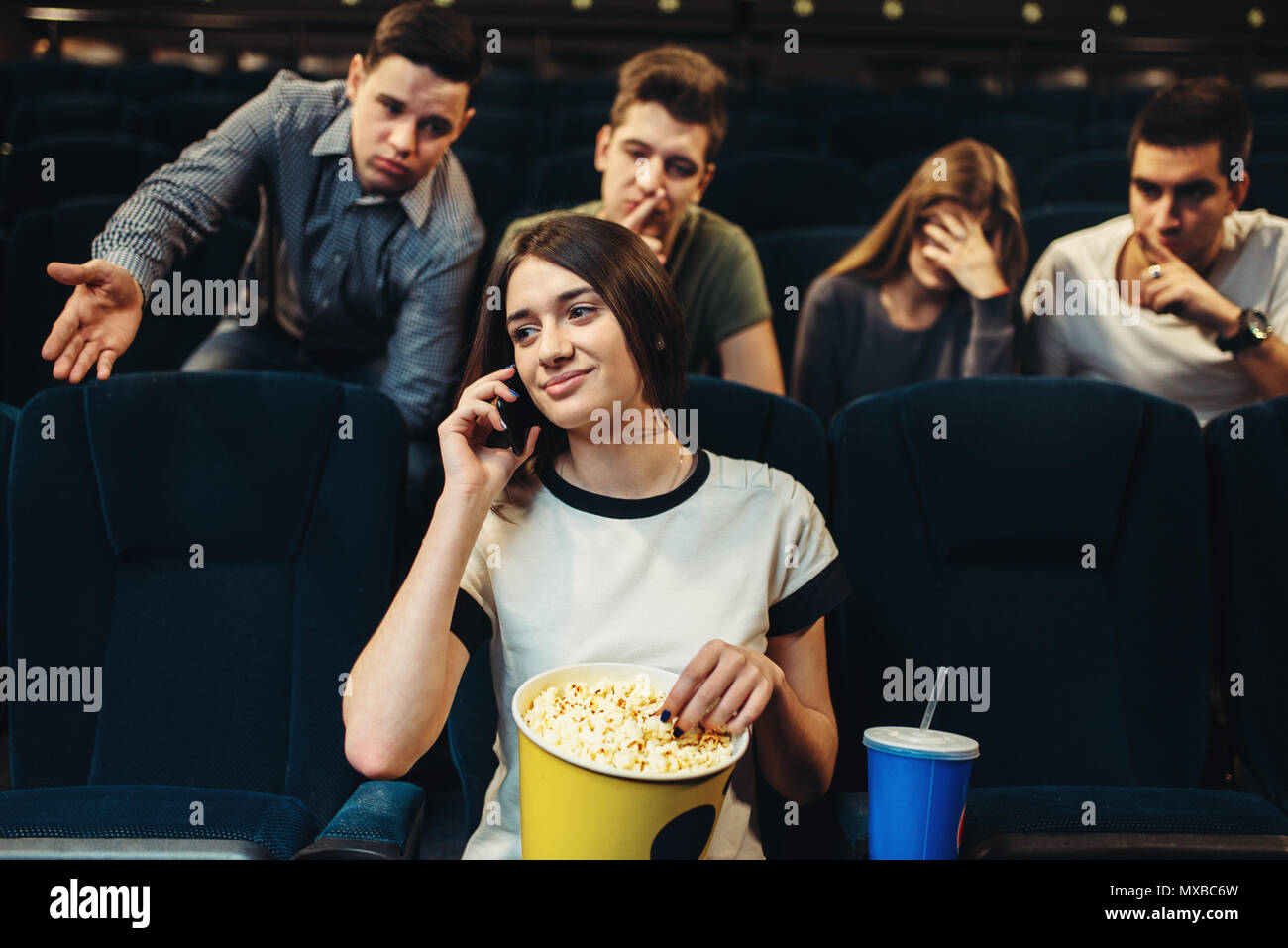 Male friends talking hall hi-res stock photography and images - Alamy