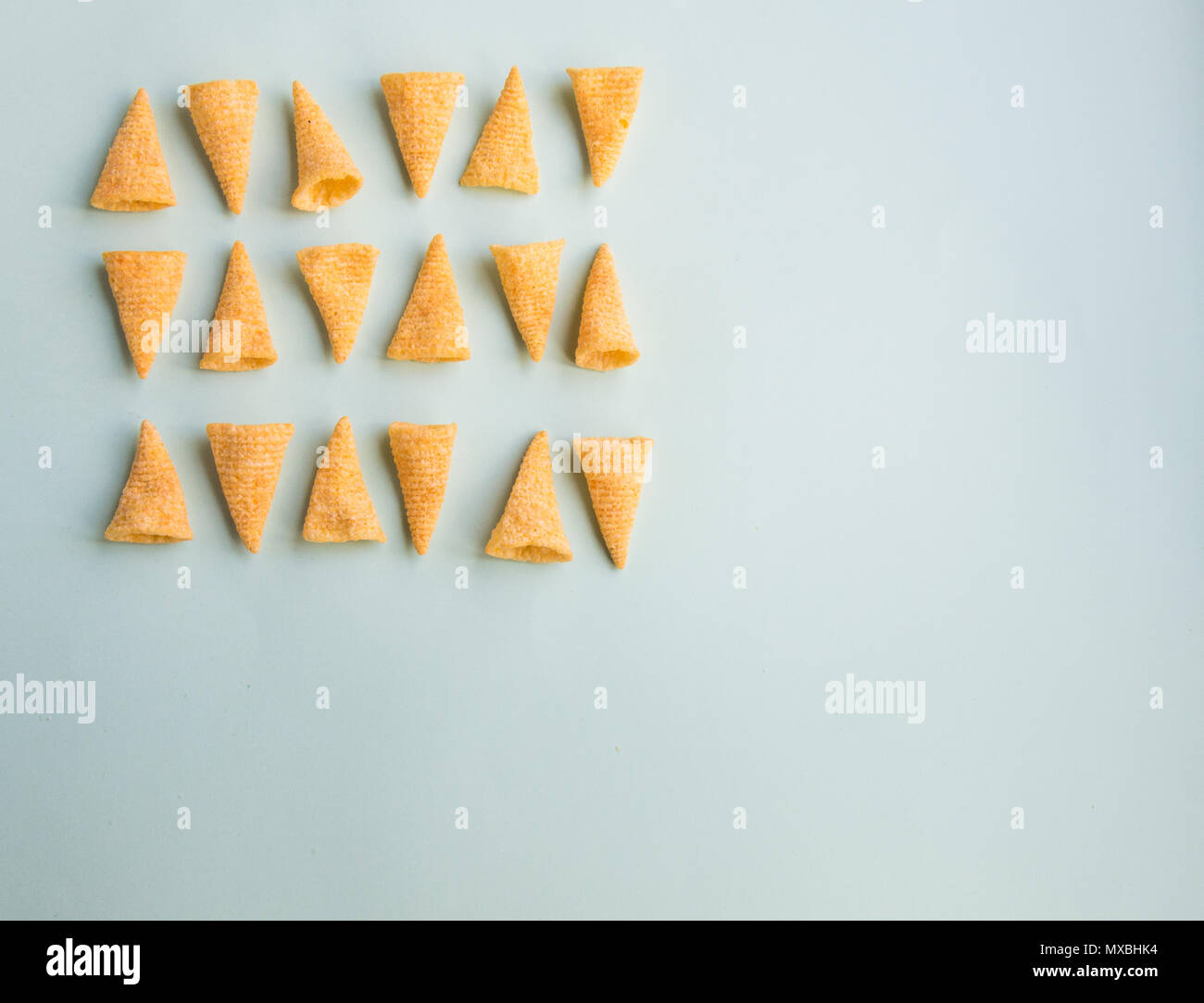 Corn cones pattern on green background with copy space Stock Photo - Alamy