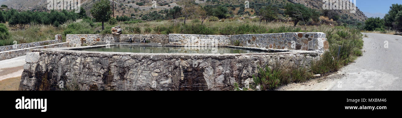 Pool with spring water near the road on the Crete island, Greece Stock ...