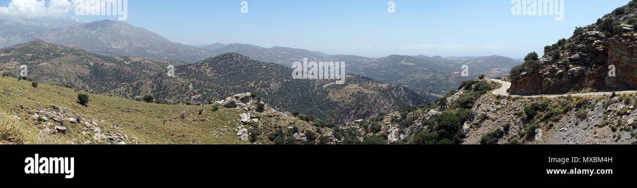 Road on the slope of mountain in Crete island, Greece Stock Photo - Alamy