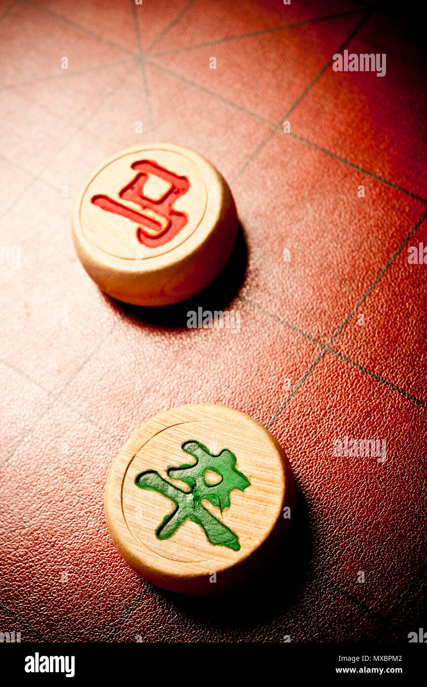 close up of Chinese chess or Xiangqi pieces on the chessboard Stock ...