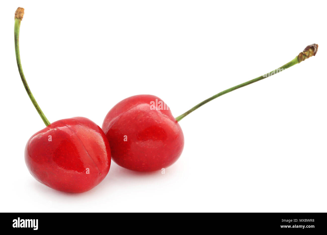 Fresh and juicy cherry over white background Stock Photo - Alamy