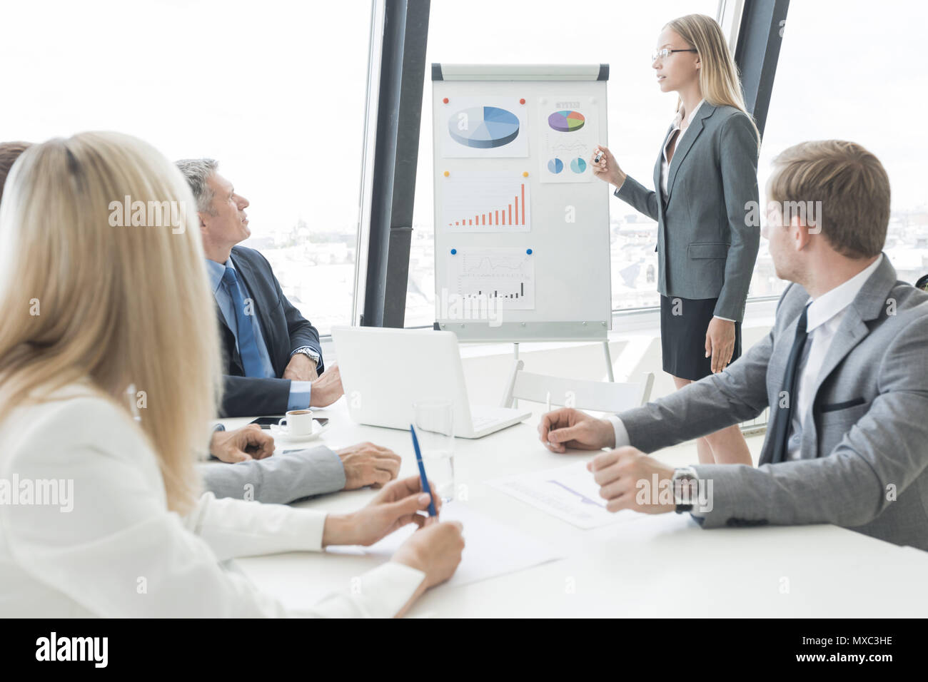 Business people team at presentation working with charts and diargams ...