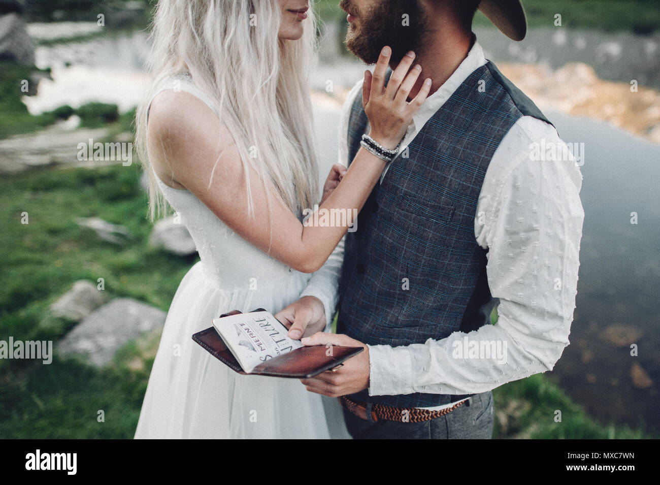 Stylish young wedding couple posing in beautiful Matterhorn moun Stock ...