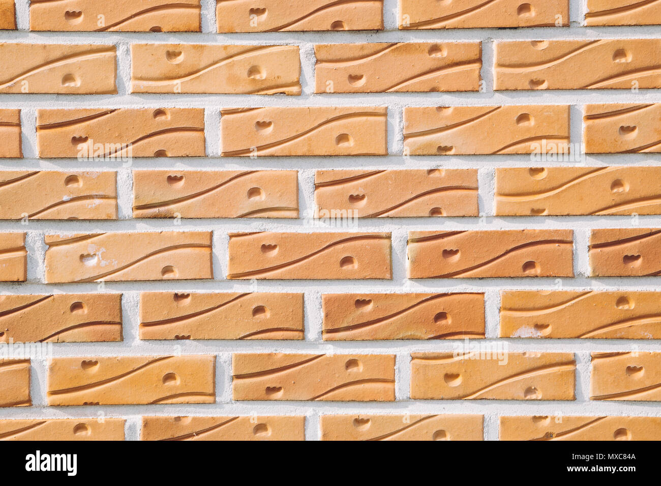 Brown brick wall detail background Stock Photo - Alamy