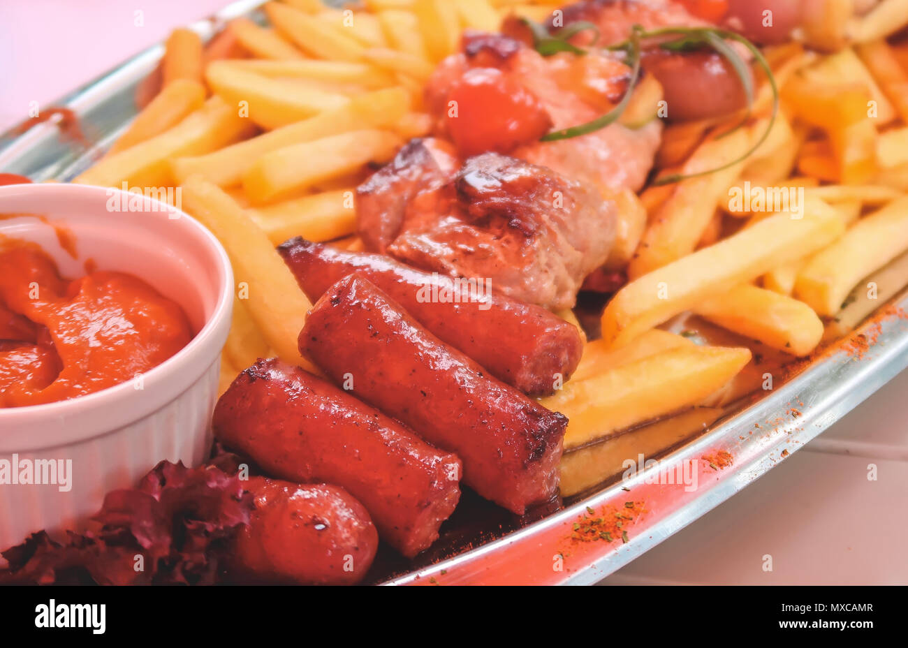 Grilled sausage served fries hi-res stock photography and images - Alamy