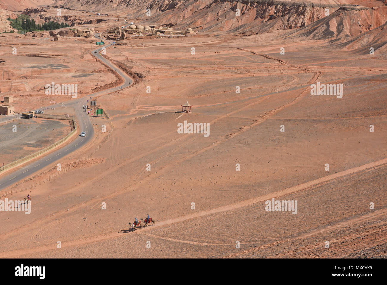 Taklamakan desert camels hi-res stock photography and images - Alamy