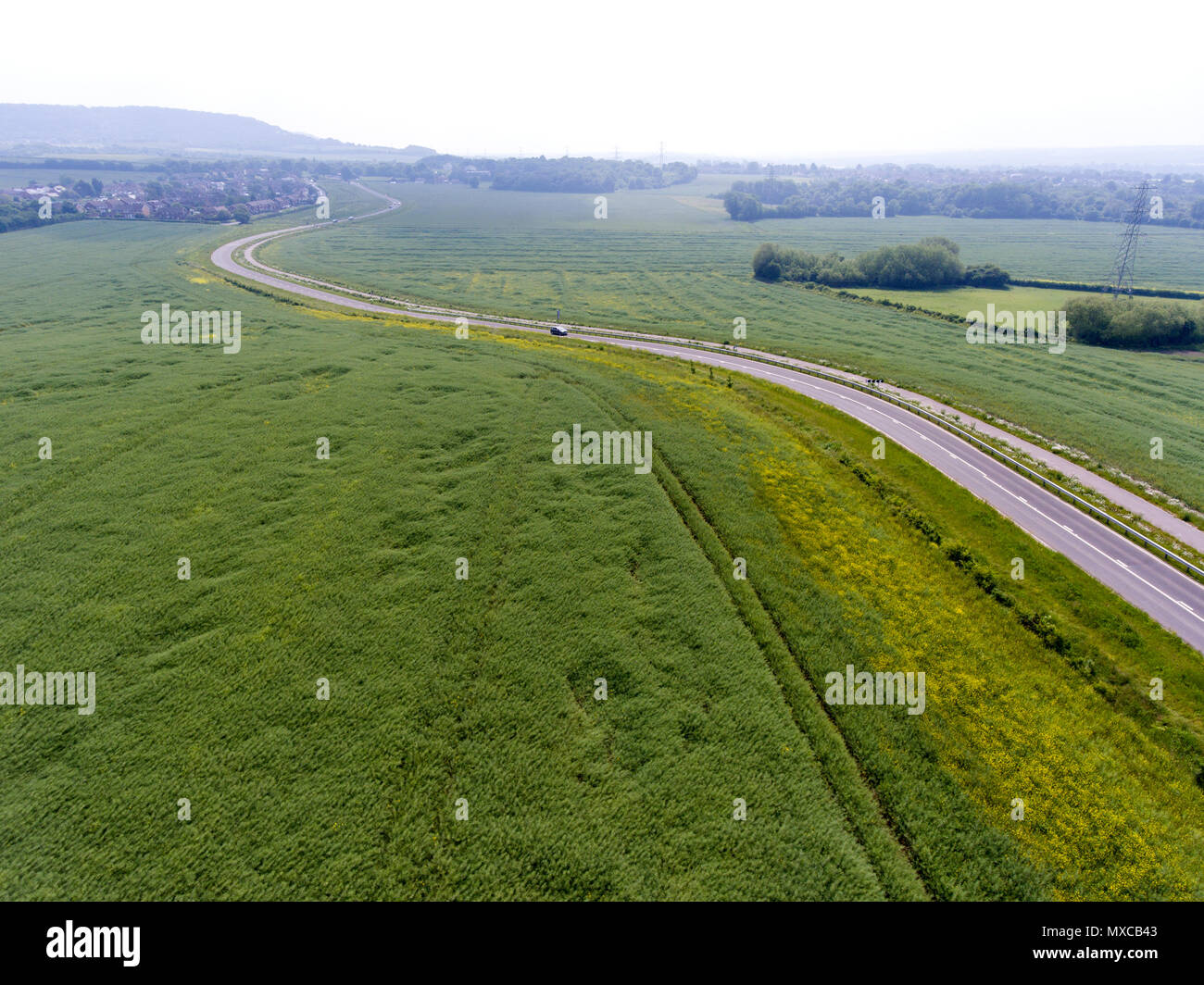 Country lane through fields, Kent, UK Stock Photo - Alamy