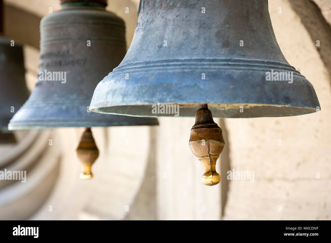 Many old bells - campanes are seen in a row Stock Photo - Alamy