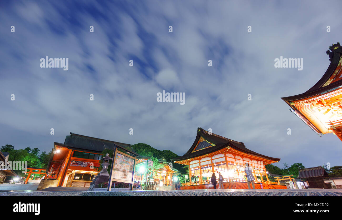 Fushimi Inari Shrine at sunset Stock Photo - Alamy