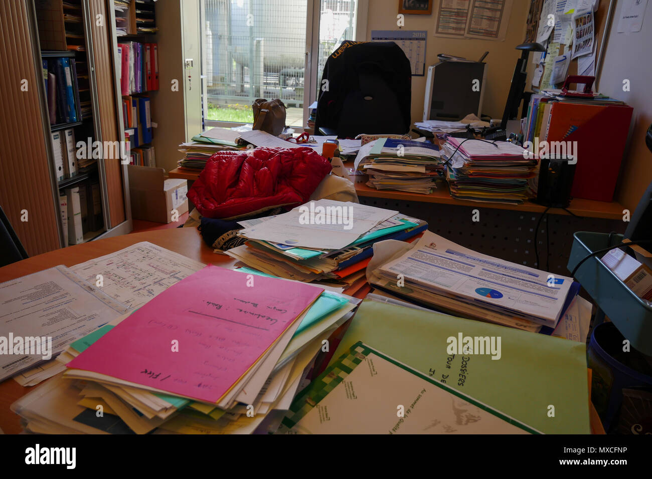 Realistic view of a messy desk, Lyon, France Stock Photo - Alamy
