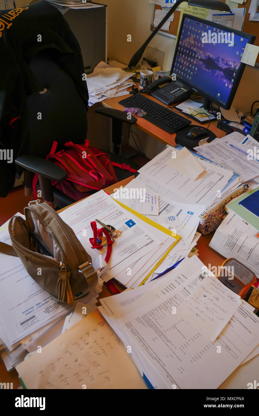Realistic view of a messy desk, Lyon, France Stock Photo - Alamy