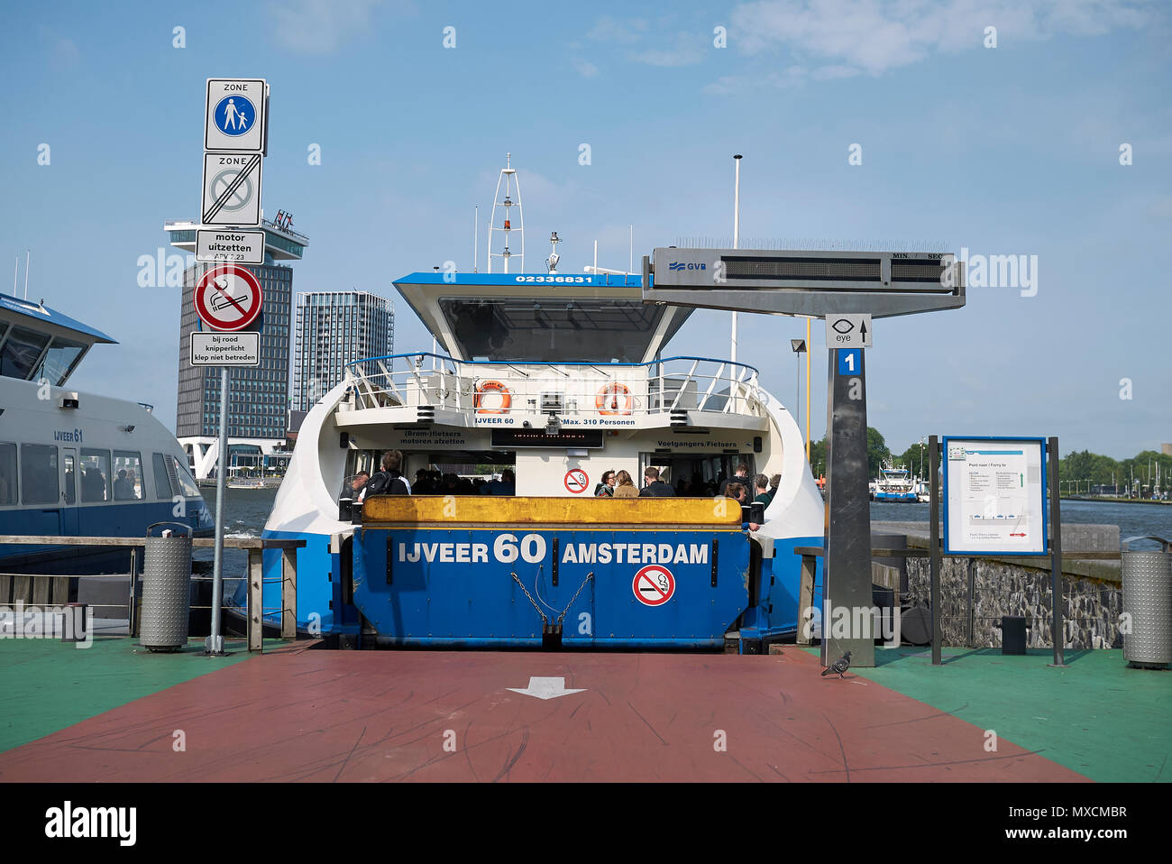 Amsterdam, Netherlands - May 16, 2018: Ferry from Amsterdam Centraal to ...