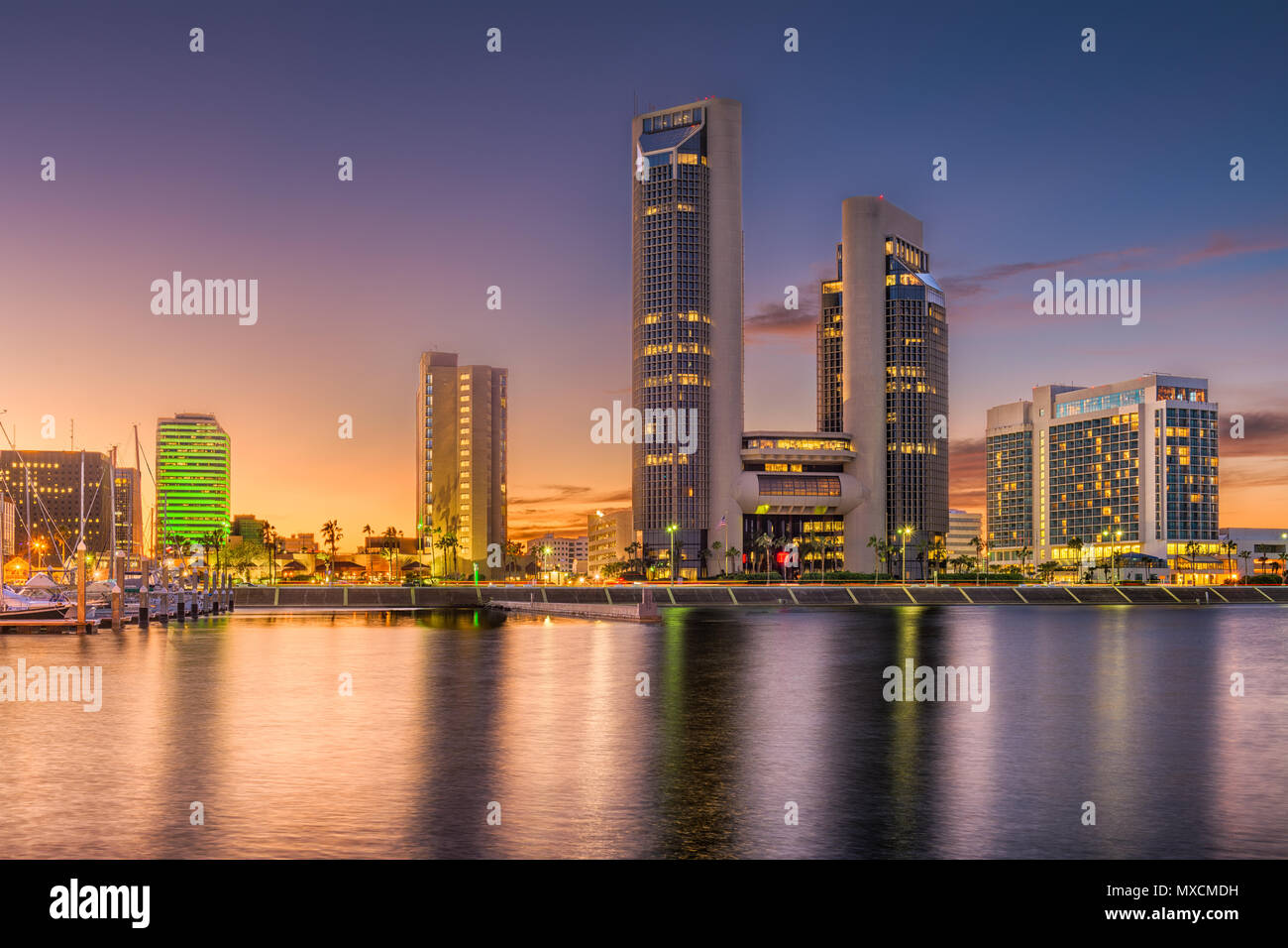 Skyscrapers and towers with the sea at night hi-res stock photography ...