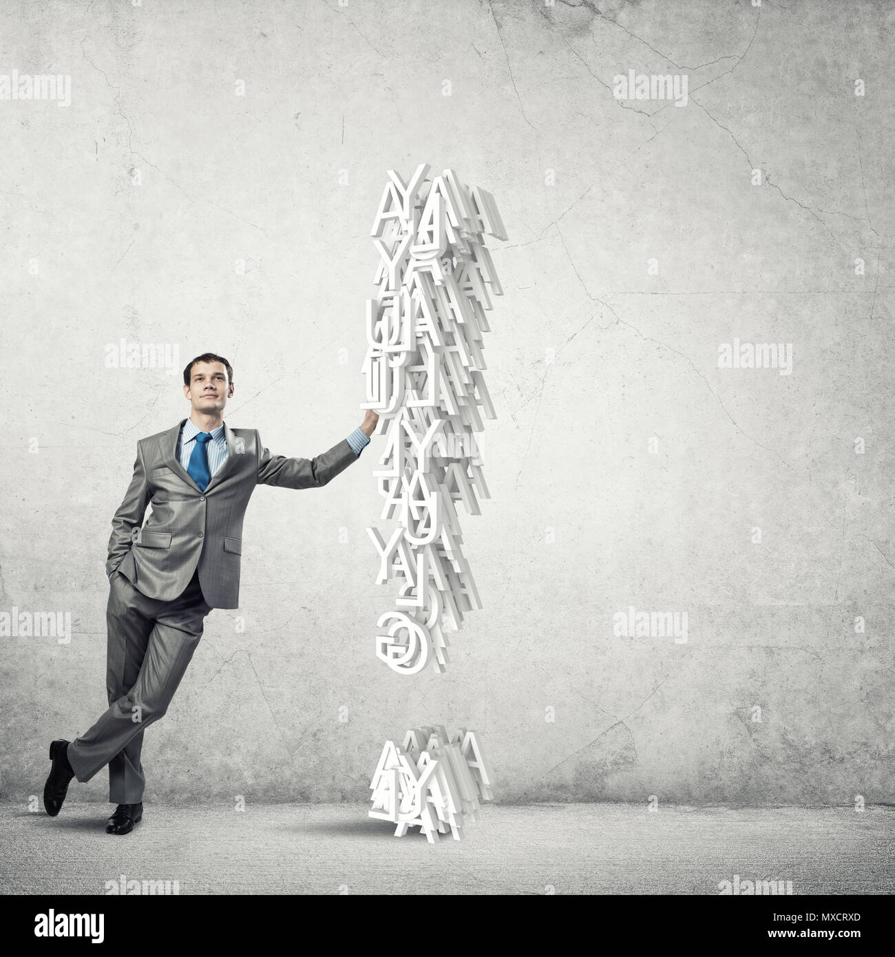 Man and big attention sign Stock Photo - Alamy