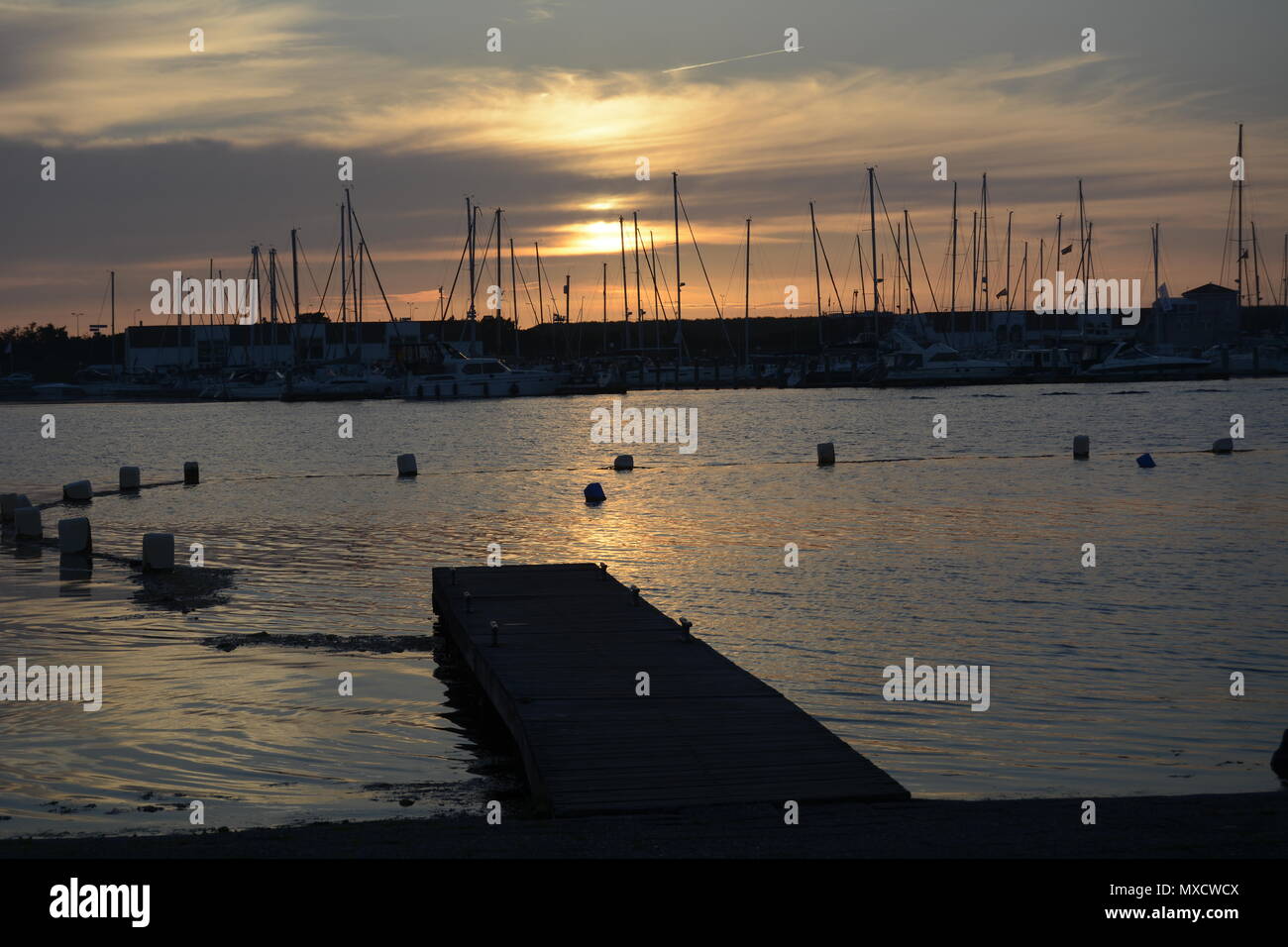 Sun harbour dusk sunset hi-res stock photography and images - Alamy