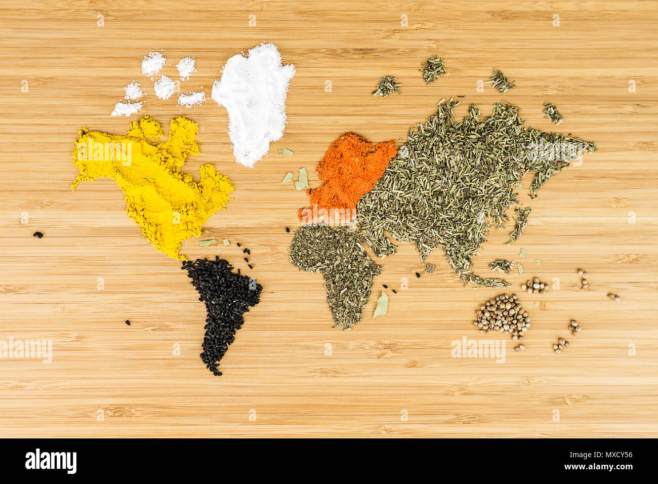 map of the world made of white various condiments and food ingredients ...