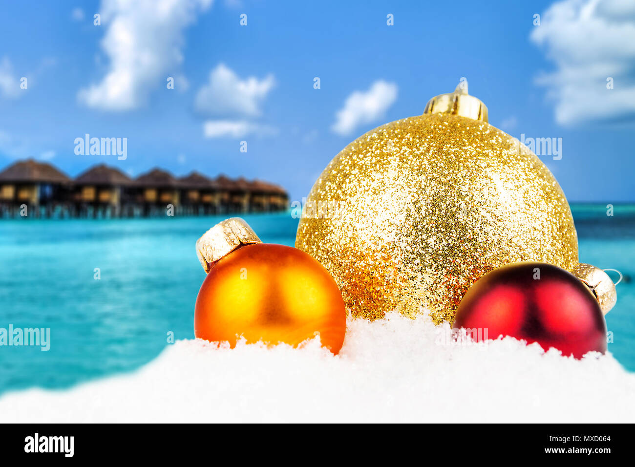 christmas theme with maldives blurred background, wooden bungalows and ...