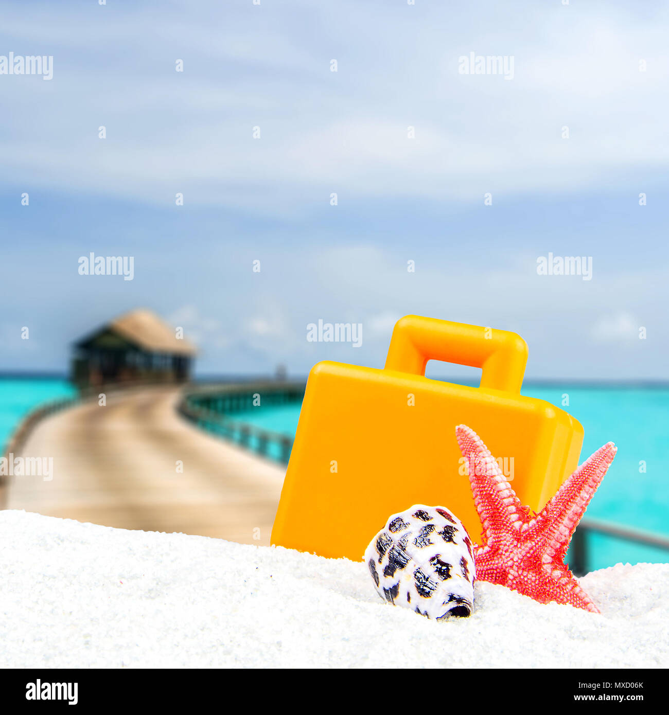 tropical theme with with maldives blurred background, wooden bungalows ...