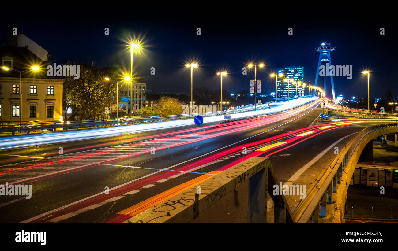 special bridge in bratislava, Slovakia at night with traffic lights ...