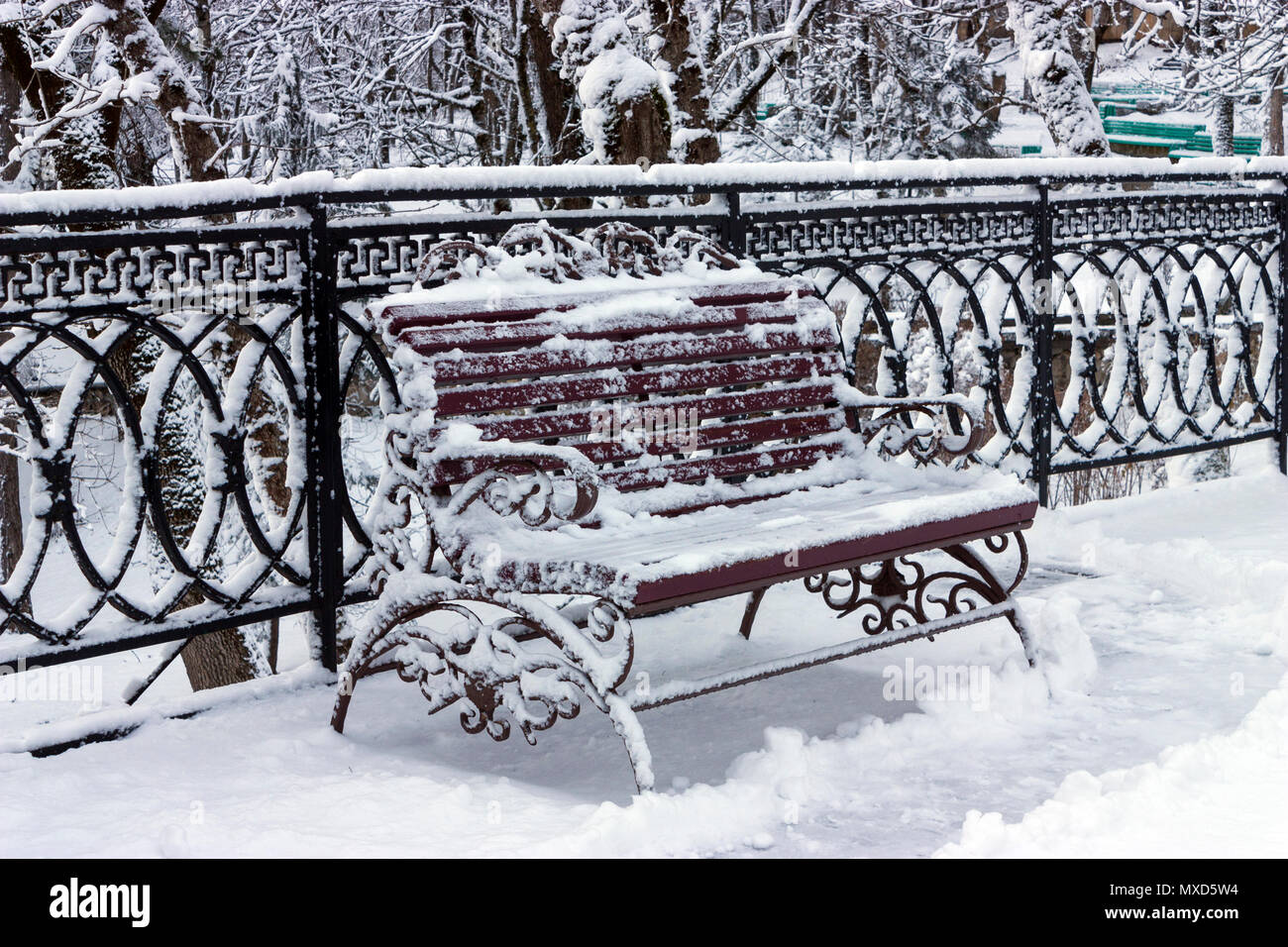 Winter scene with park bench Stock Photo - Alamy