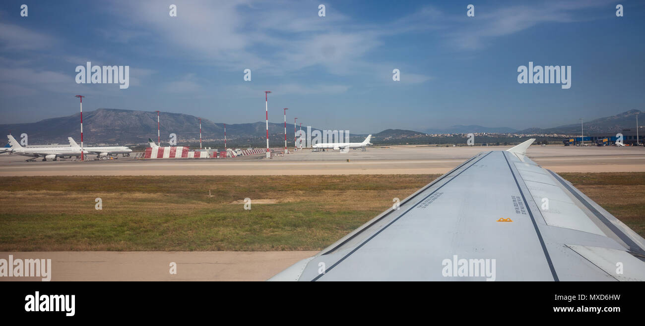 Plane landed in Athens, Greece airport. View out of airplane window ...