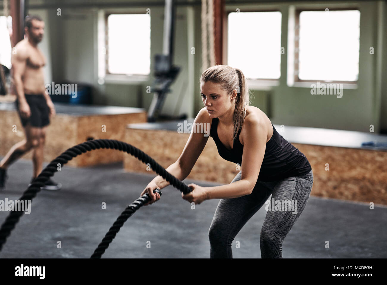 Woman swinging arms hi-res stock photography and images - Alamy