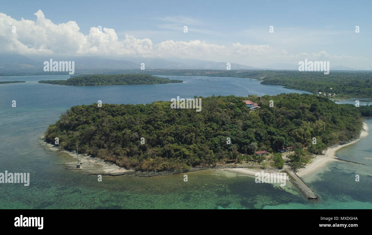 Tropical island with white sandy beach. Aerial view: Magalawa island ...