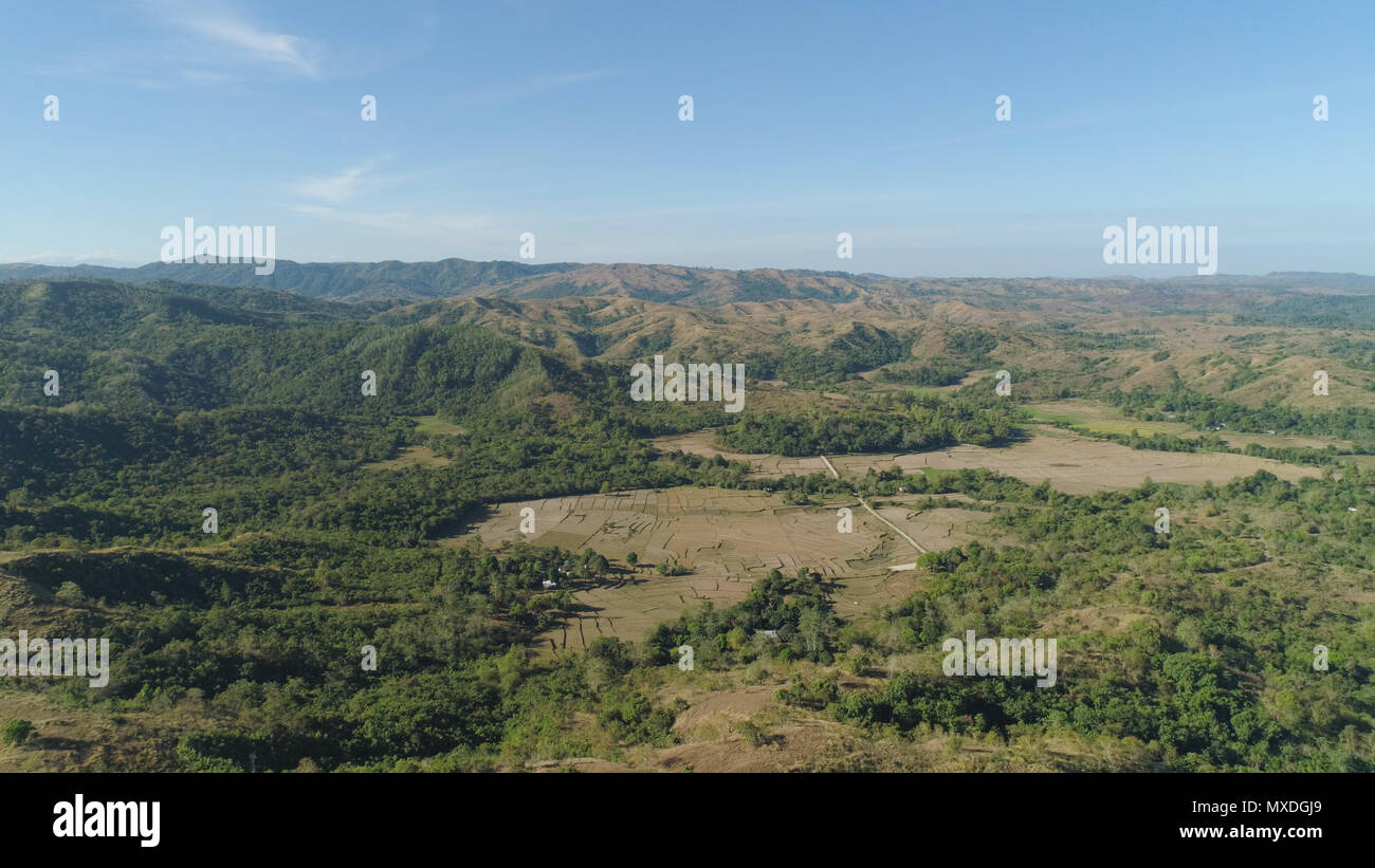 Mountain valley with village, farmland in the Philippines, Luzon ...