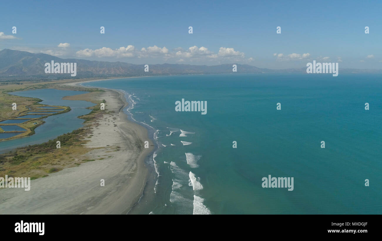 Aerial view of sandy beach Lingayen with azure water on the island ...