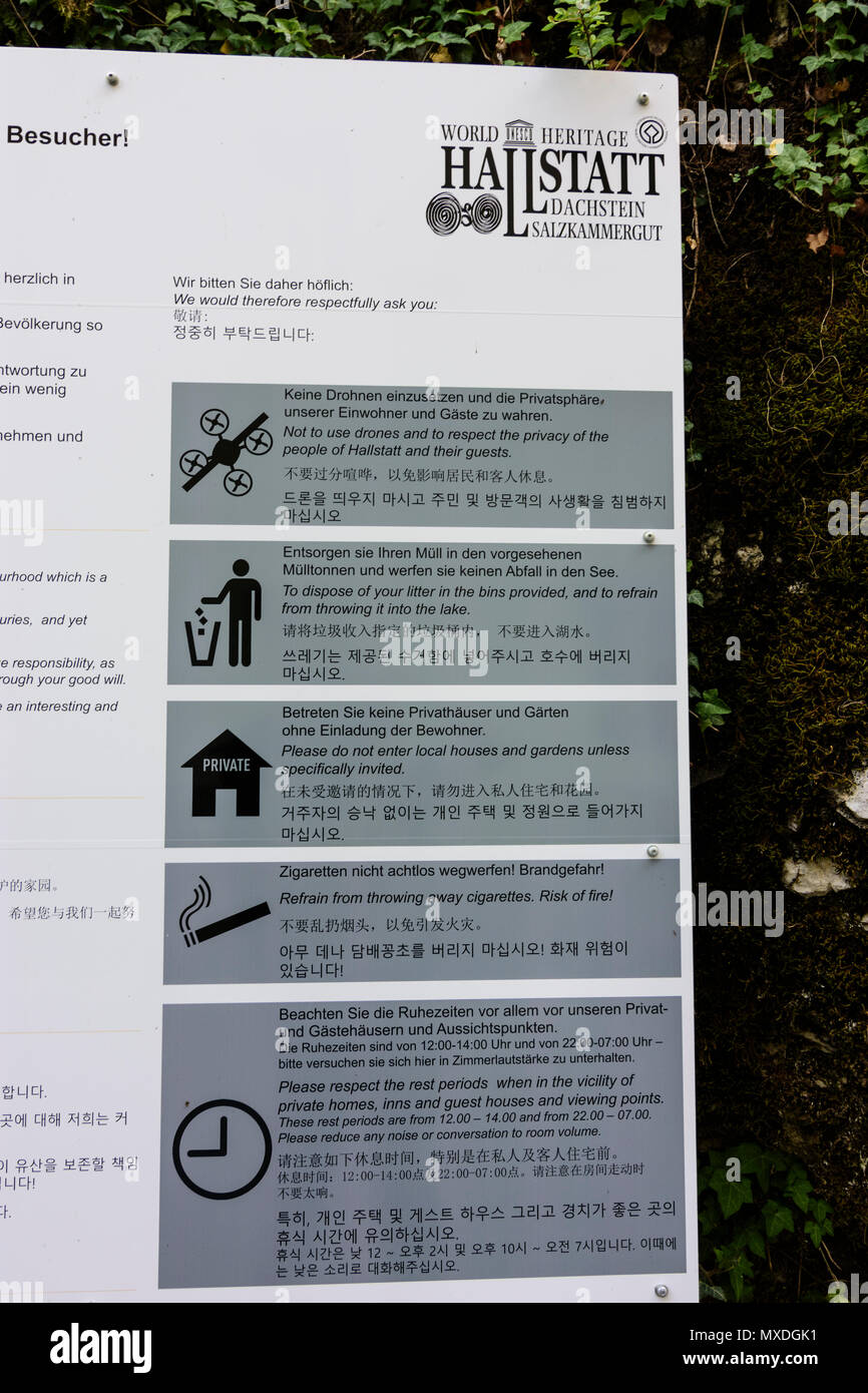 Hallstatt: notice board, signboard for Code of Conduct for tourists ...