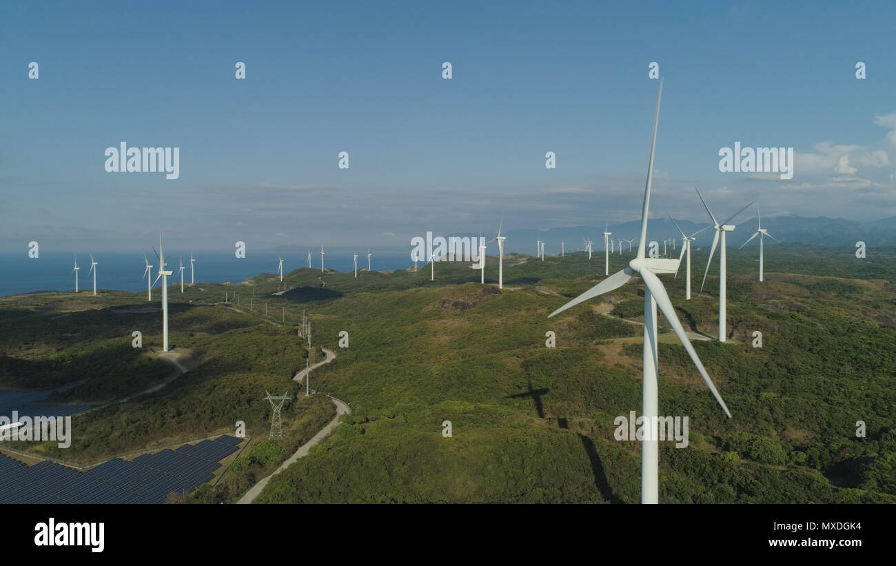 Aerial view of Windmills for electric power production on the seashore ...
