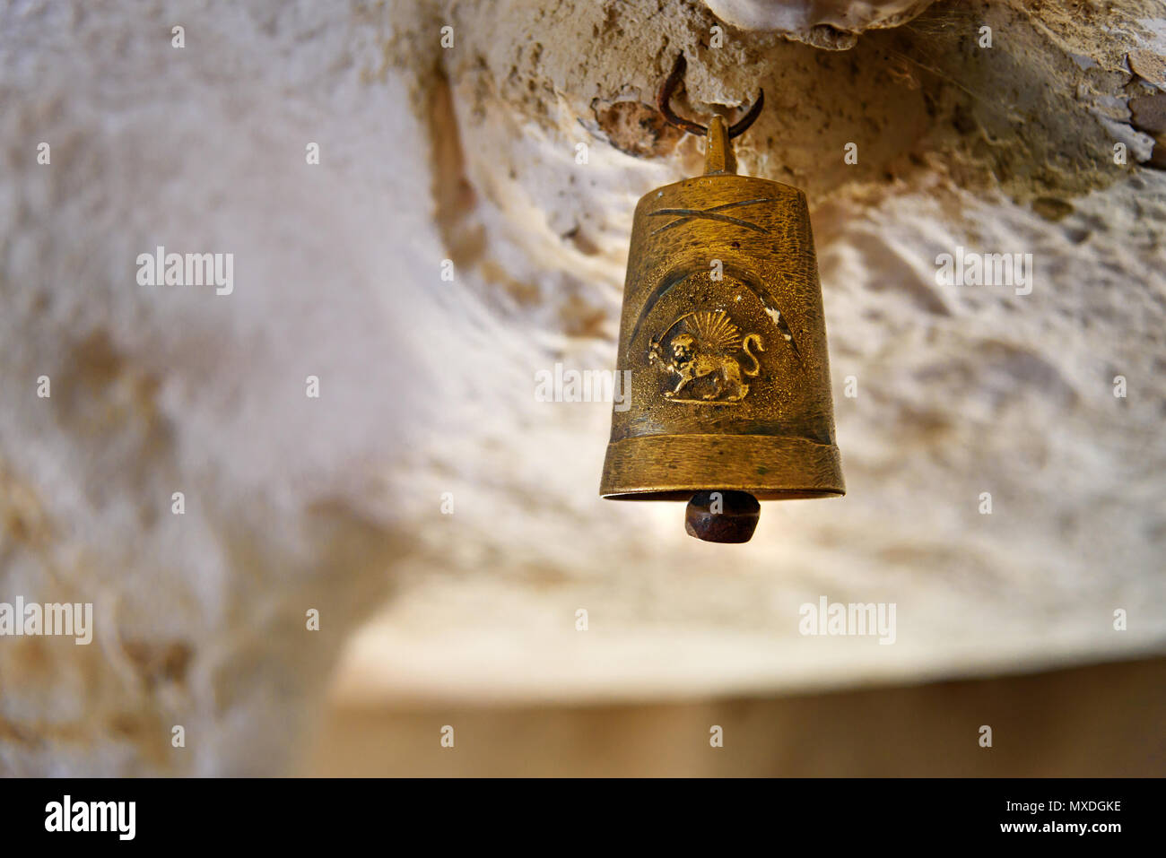 Old bell with Lion and Sun is one of the main emblems of Iran. On the ...