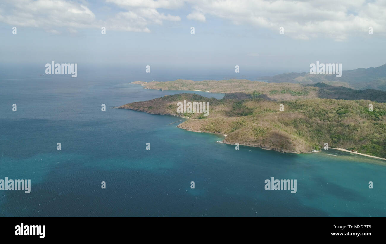 Aerial view of seashore with beach, lagoons and coral reefs ...