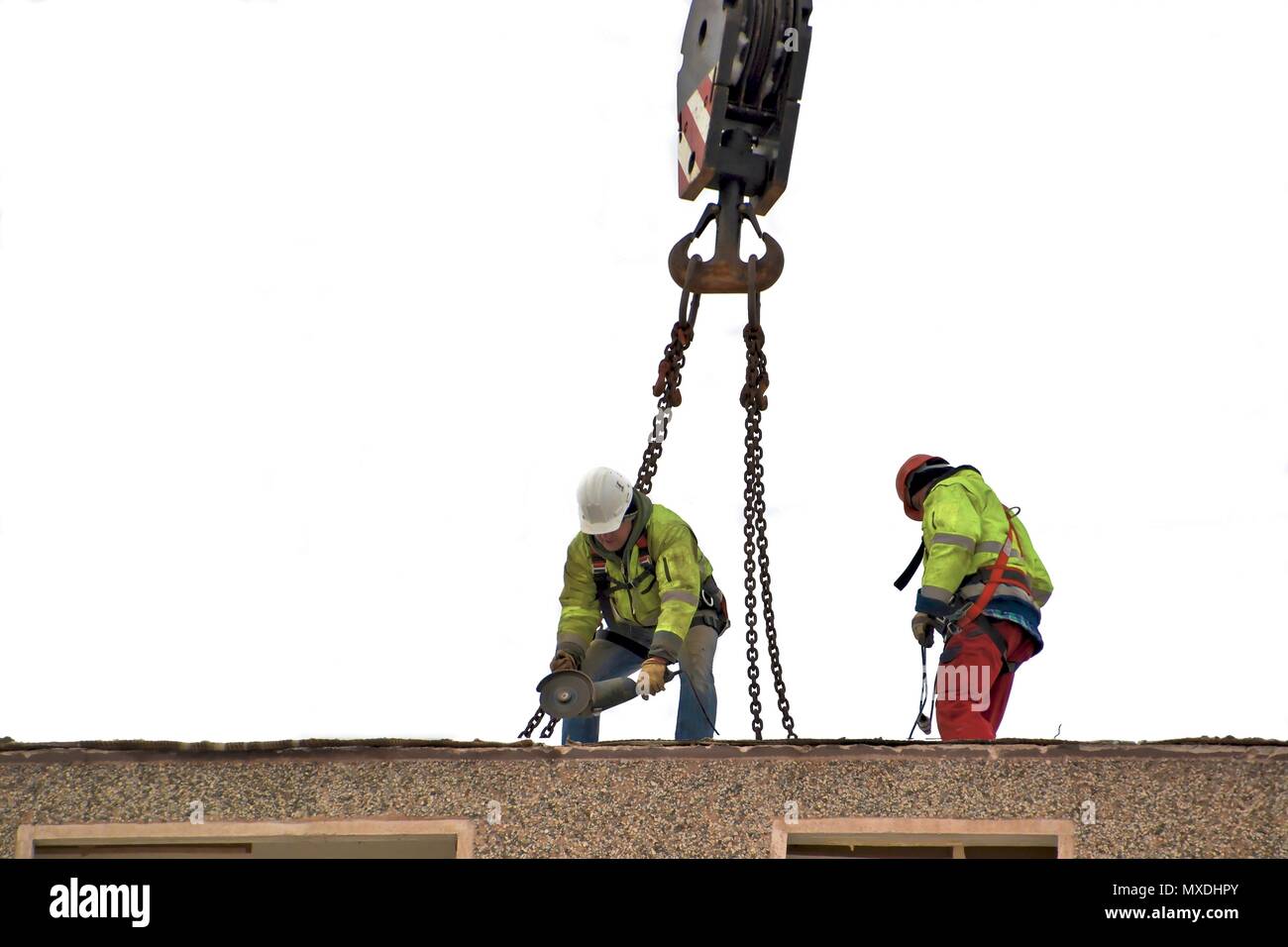 Workers in the disassembly of a house Stock Photo - Alamy