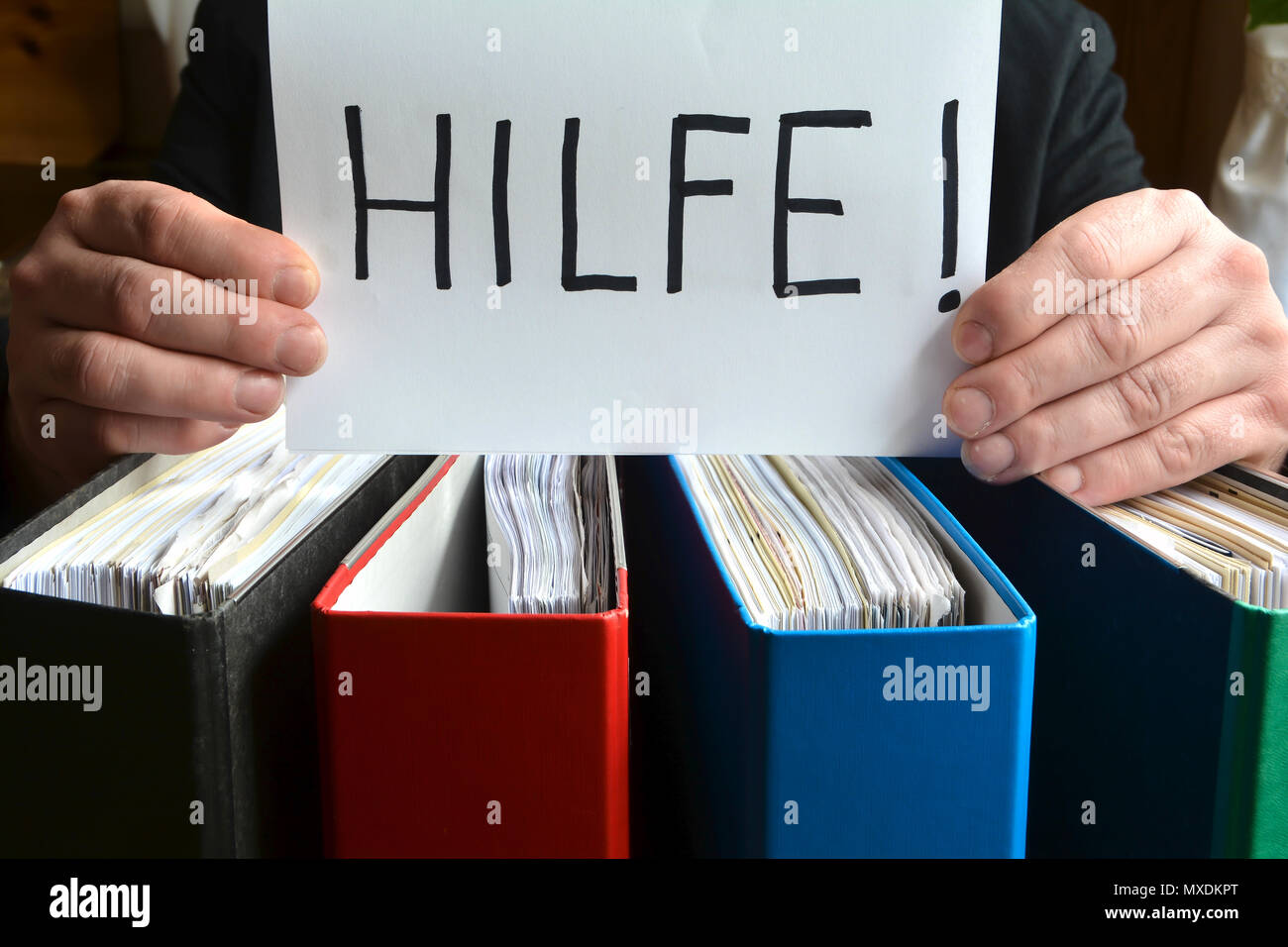 Office worker and a sign saying "Help Stock Photo - Alamy