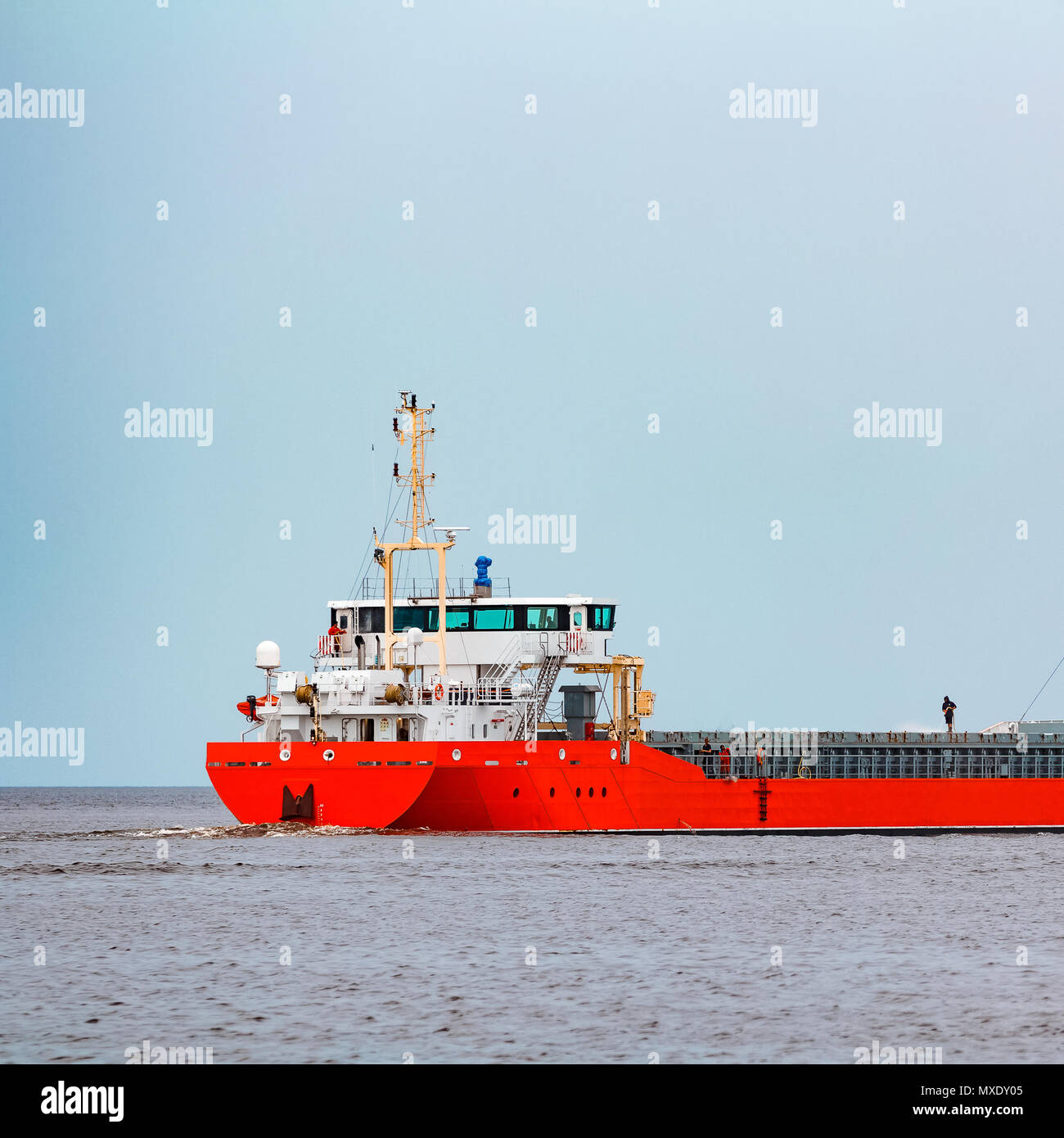 Orange cargo ship. Logistics and merchandise transportations Stock ...