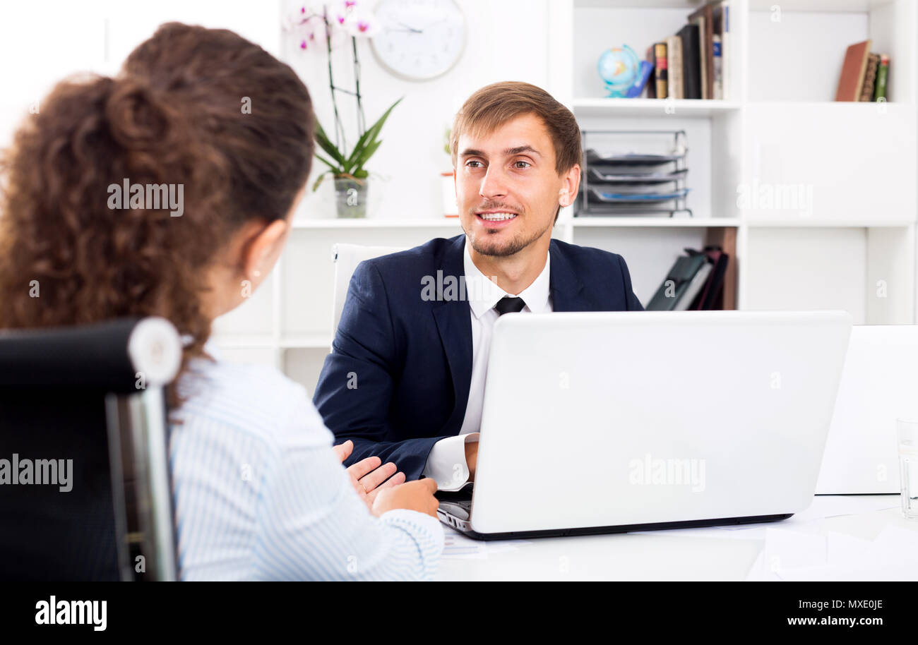 Successful man manager sitting and working on computer in office Stock ...