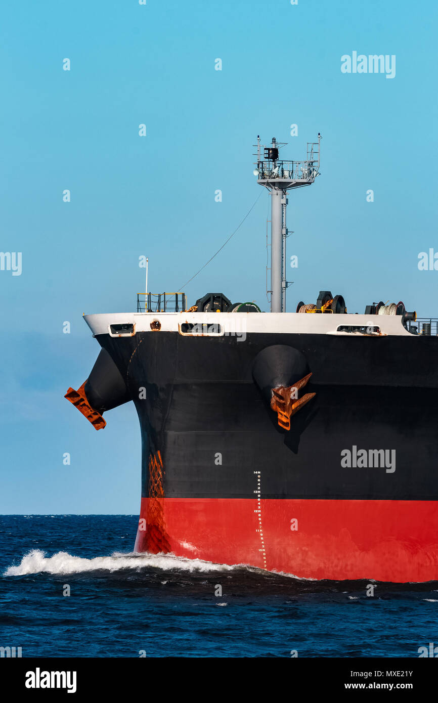 Black bulker ship. Logistics and merchandise transportations Stock ...