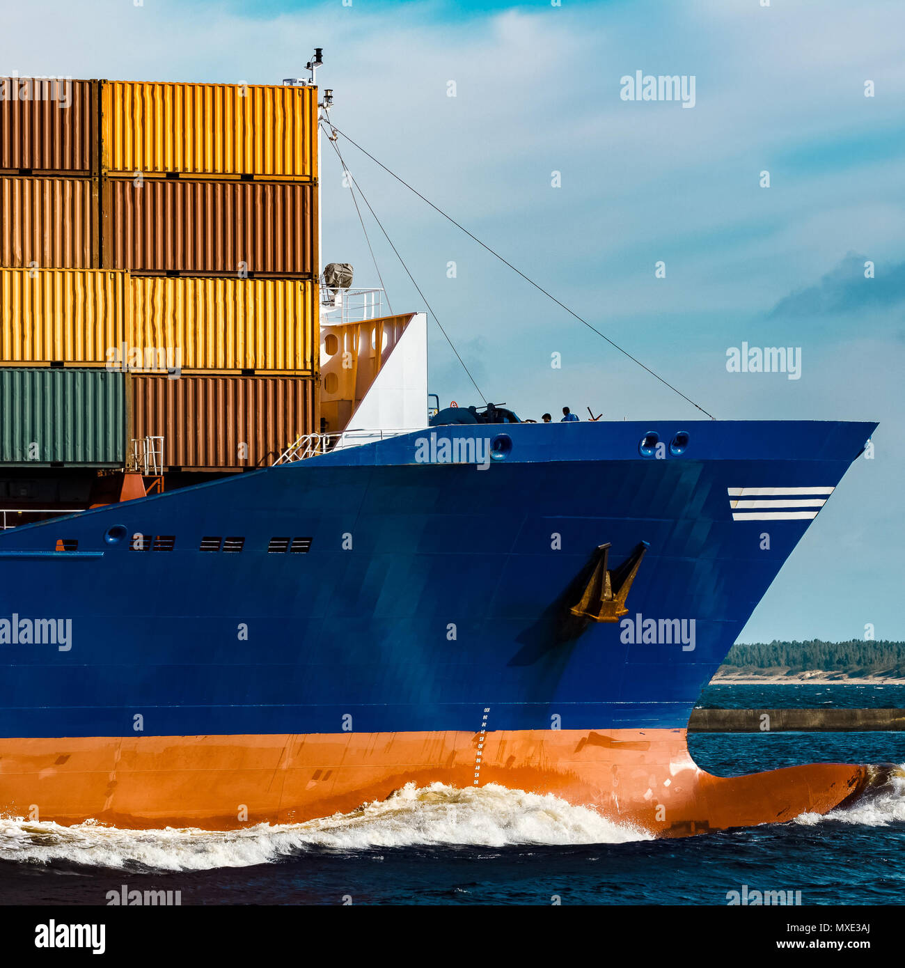 Blue container ship in travel. Logistics and freight industry Stock ...