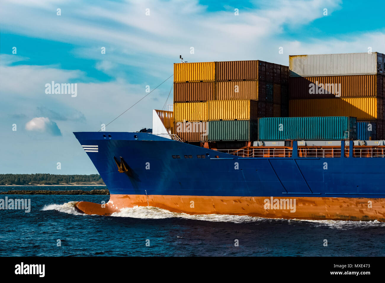 Blue container ship in travel. Logistics and freight industry Stock ...