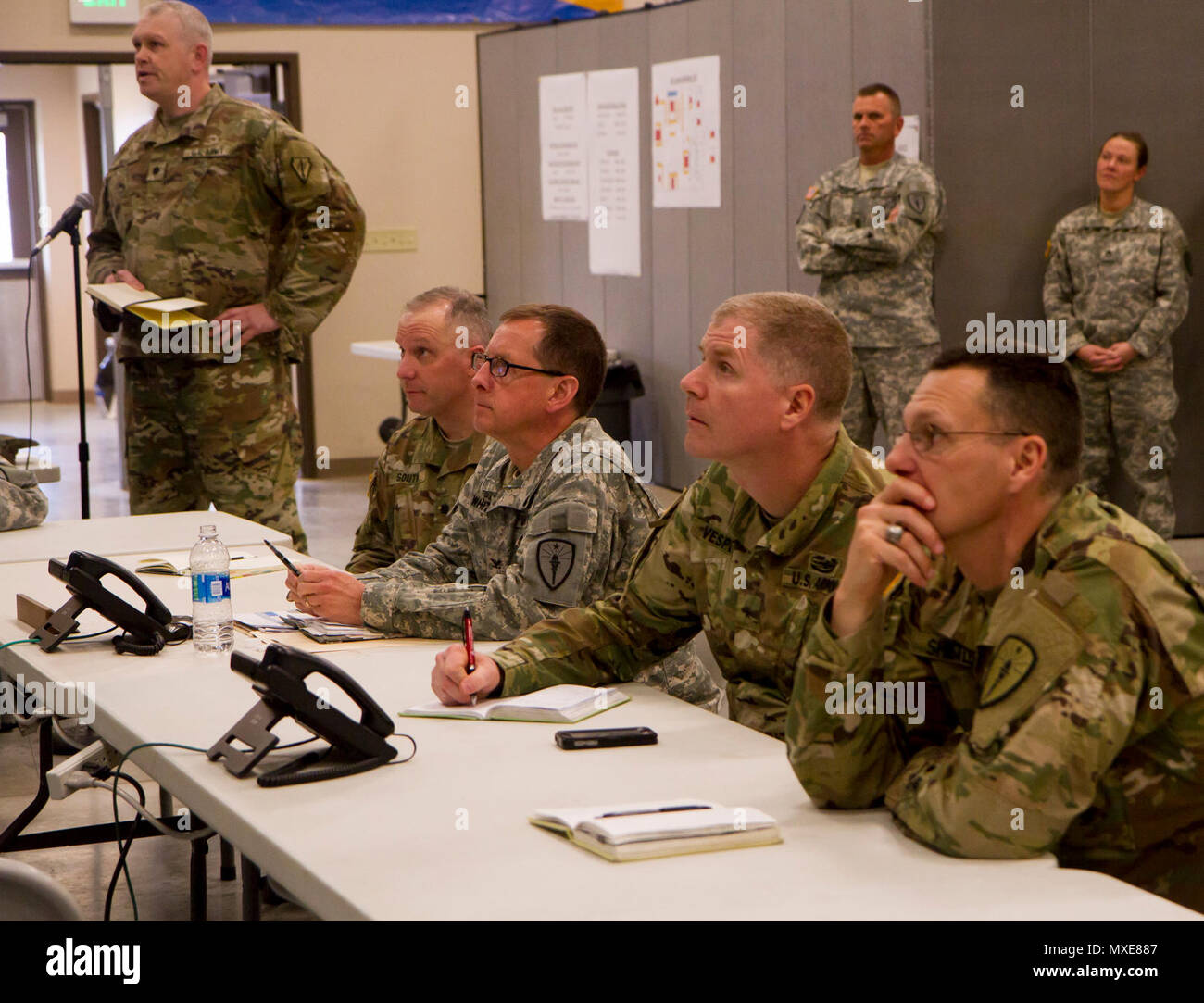 81st Troop Command staff personnel deliver a mission analysis briefing ...