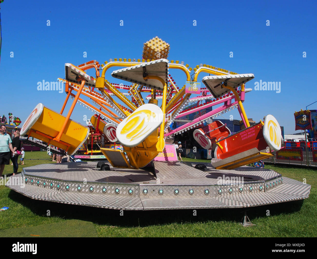 A childrens ride at the funfair Stock Photo - Alamy