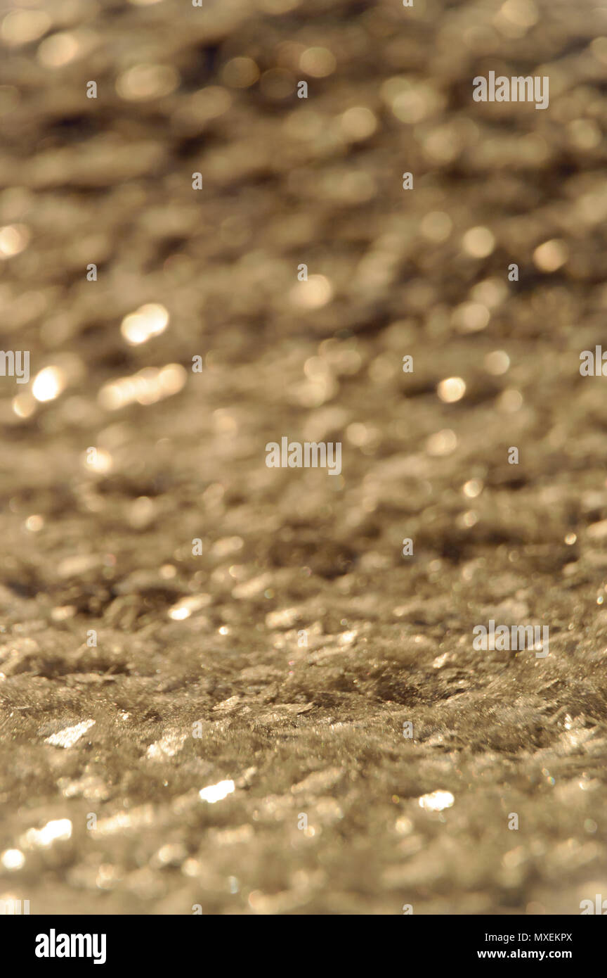 Sparkling snow flakes in winter sun Stock Photo - Alamy
